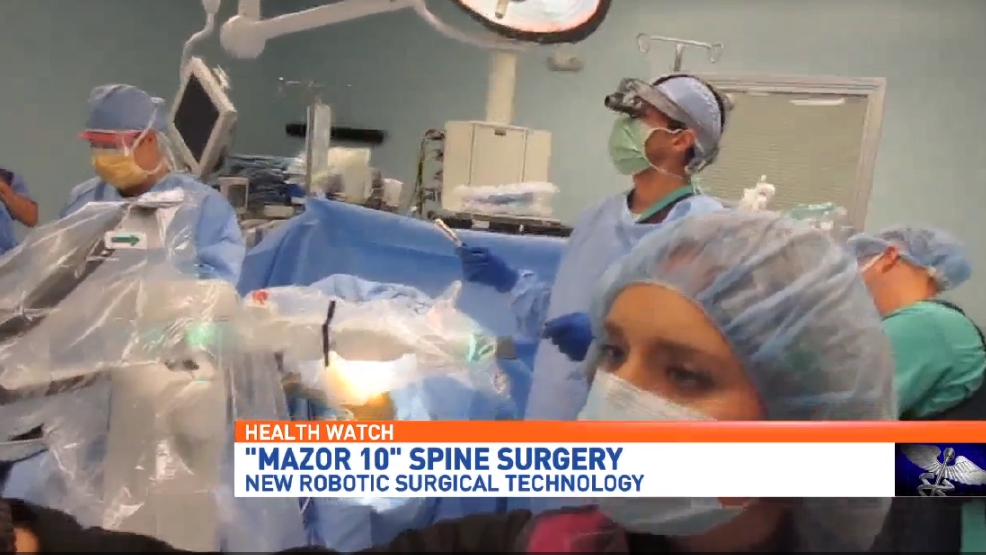 Destin doctor uses surgical robot for high-precision spinal surgery | WEAR